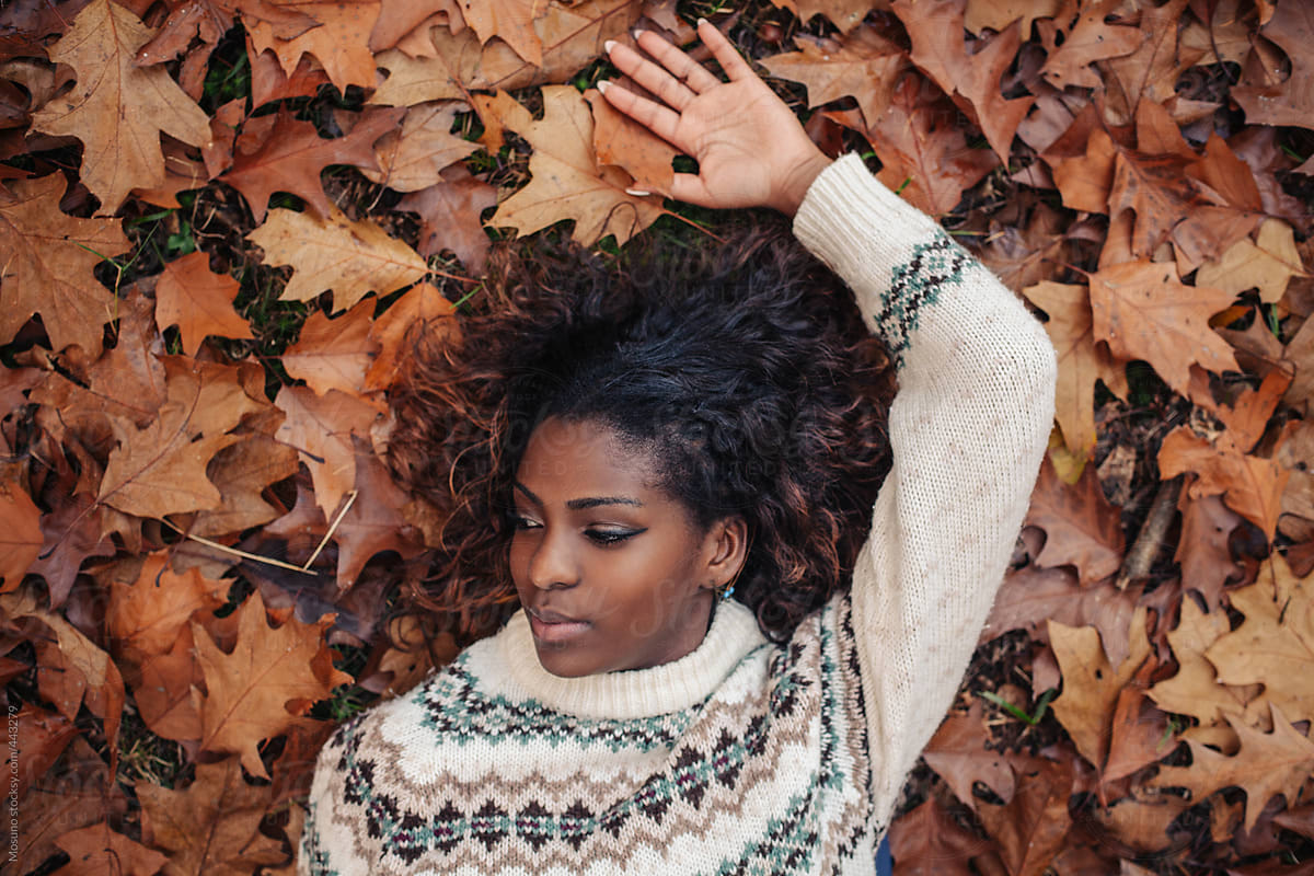 "Model Posing In The Autumn Leaves" by Stocksy Contributor "Mosuno ...