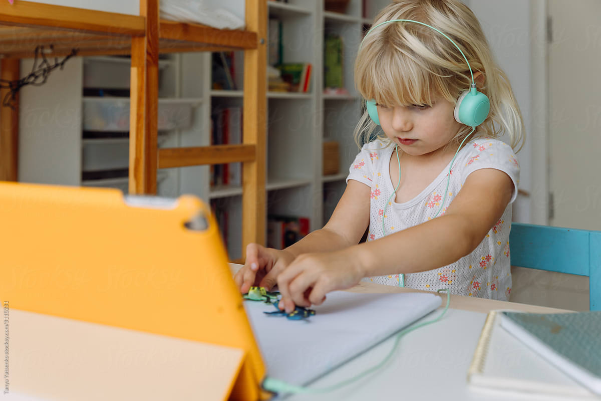 "Girl Watching A Video On A Tablet Computer" by Stocksy Contributor ...