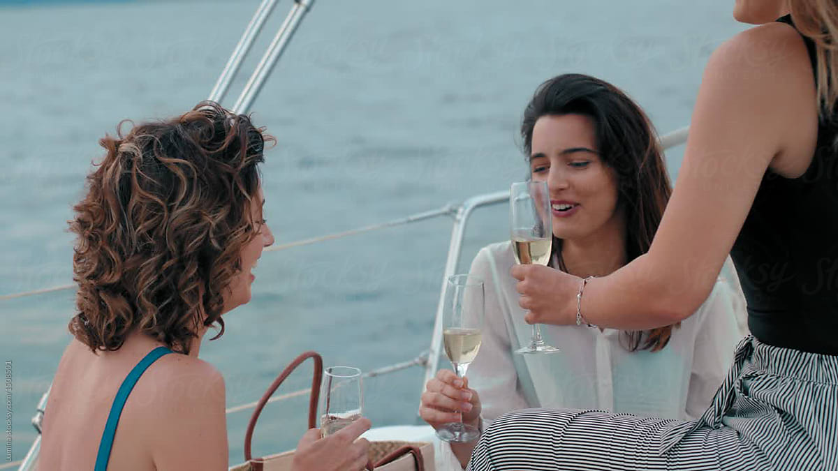 "Girlfriends Enjoying On Sailing Boat" by Stocksy Contributor "Lumina ...