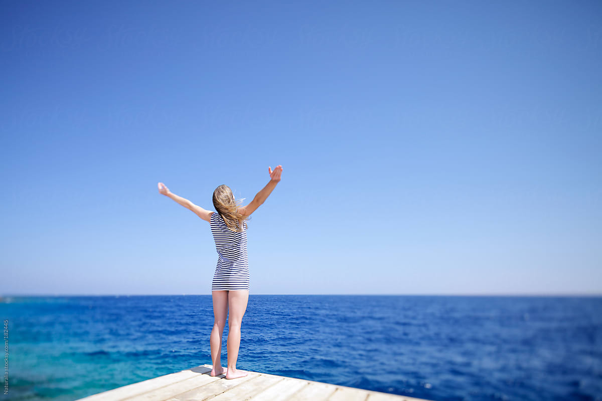 "Woman On Sea Beach Arms Raised On Summer Nature" by Stocksy ...