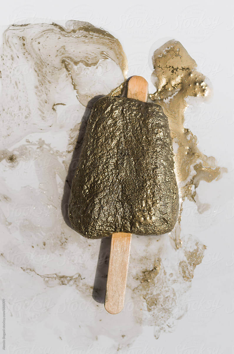 "Melted Gold Popsicle" by Stocksy Contributor "Alessio Bogani" - Stocksy