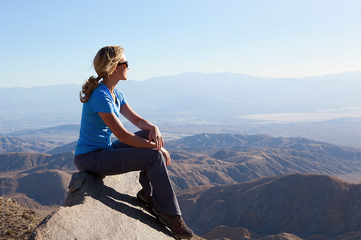 "Young Female Looking Off Over Valley At Sunset" by Stocksy Contributor ...