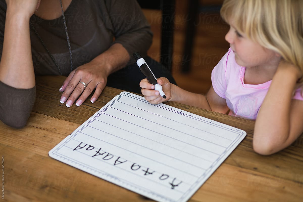 "Learning To Print." by Stocksy Contributor "Cherish Bryck" - Stocksy