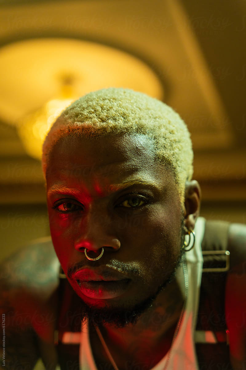 "Alternative Gay Man With Blond Hair Looking Intense" by Stocksy ...