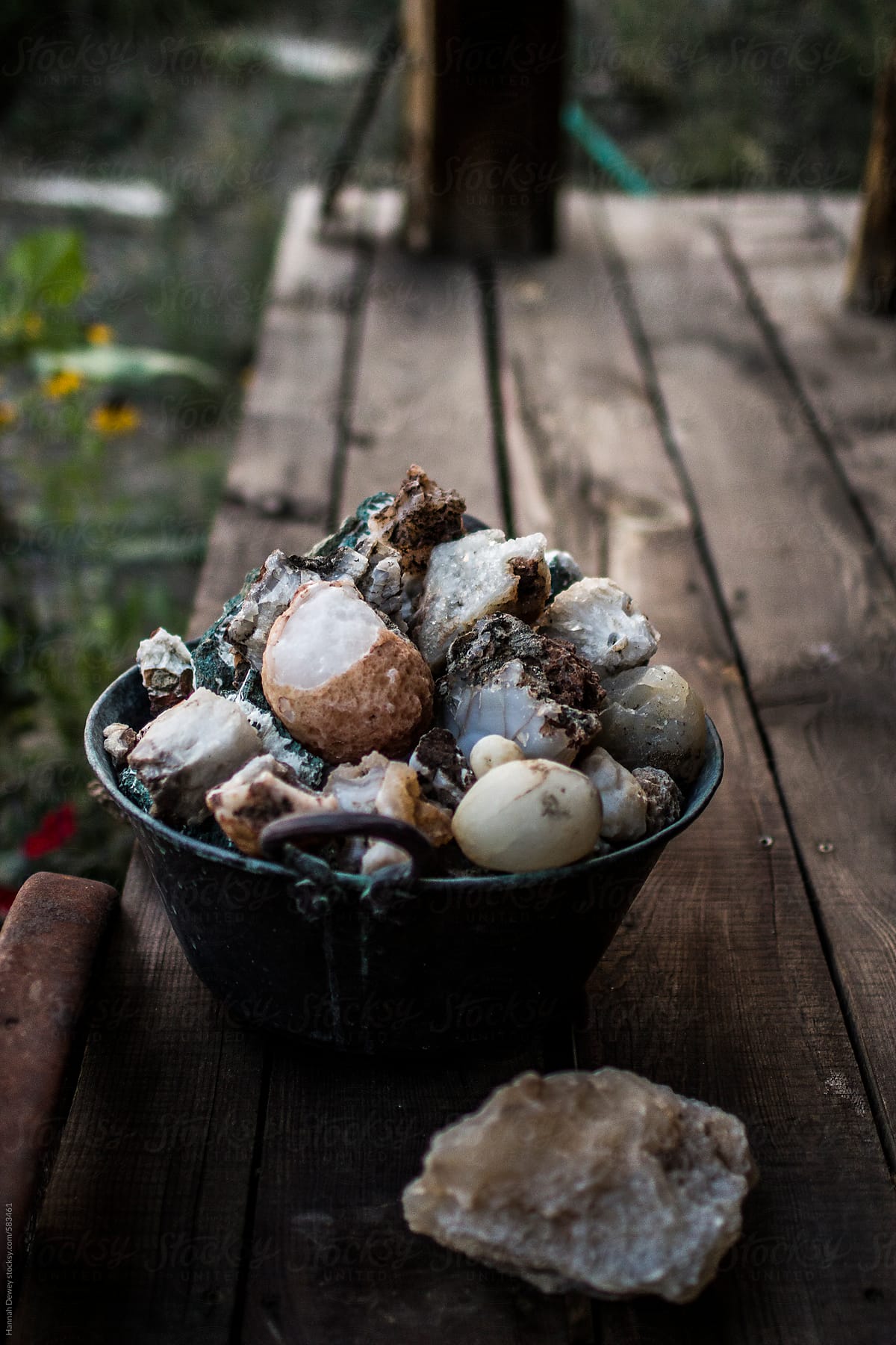 "A Bucket Of Rocks Sits On The Front Stoop Of A Cabin In Rural Idaho ...
