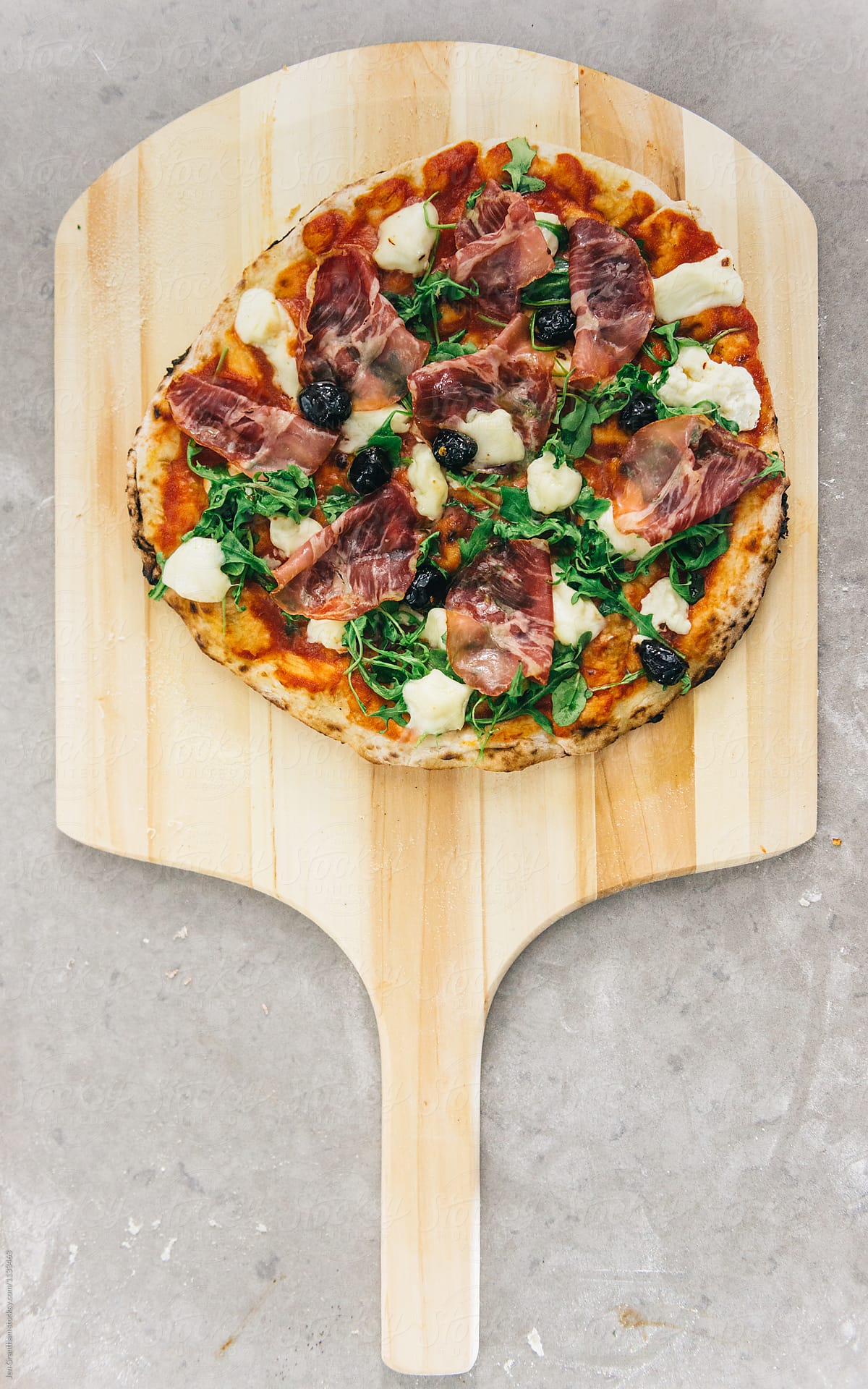 "Overhead Pizza" by Stocksy Contributor "Jen Grantham" - Stocksy