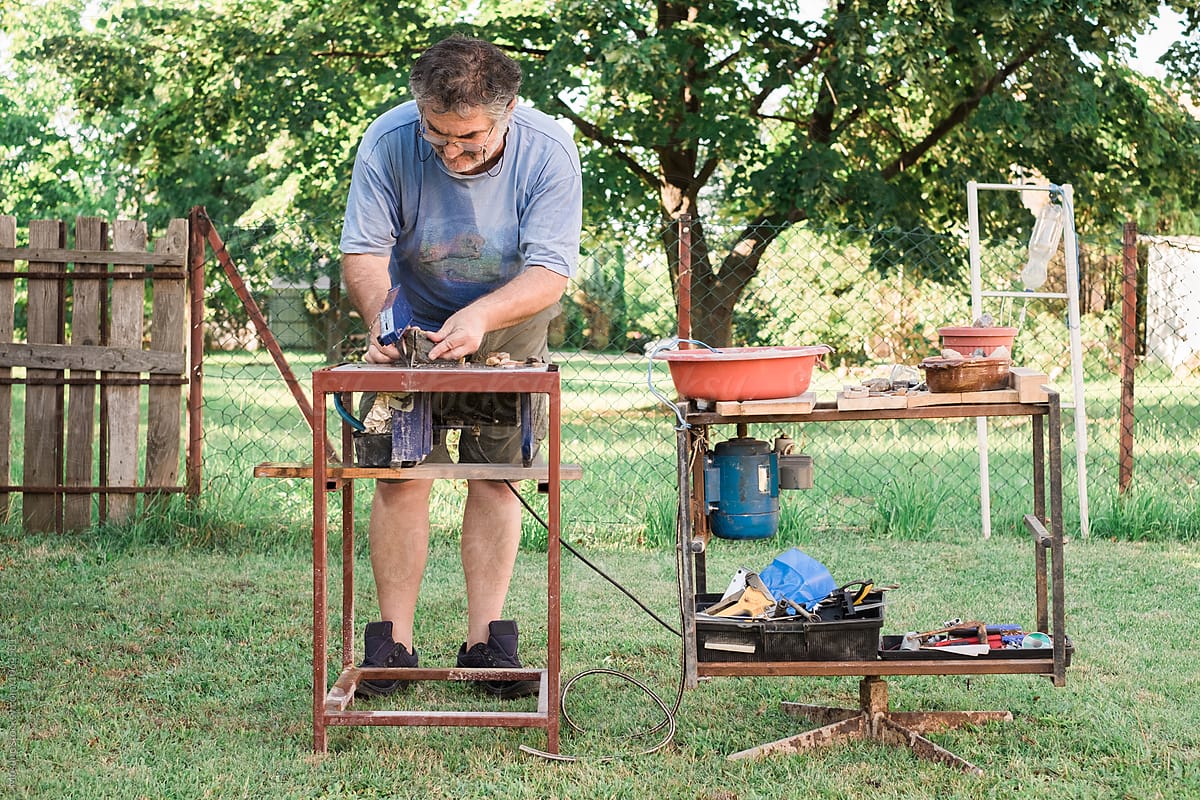 "Lapidary Working In A Yard" by Stocksy Contributor "Mosuno" - Stocksy