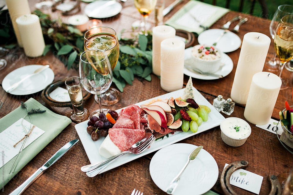 "Wedding Table Spread" by Stocksy Contributor "Adam Naples" - Stocksy
