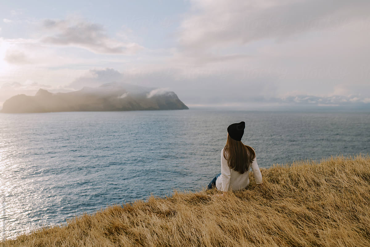 "Back View Of Traveler Woman" by Stocksy Contributor "Julia Volk" - Stocksy