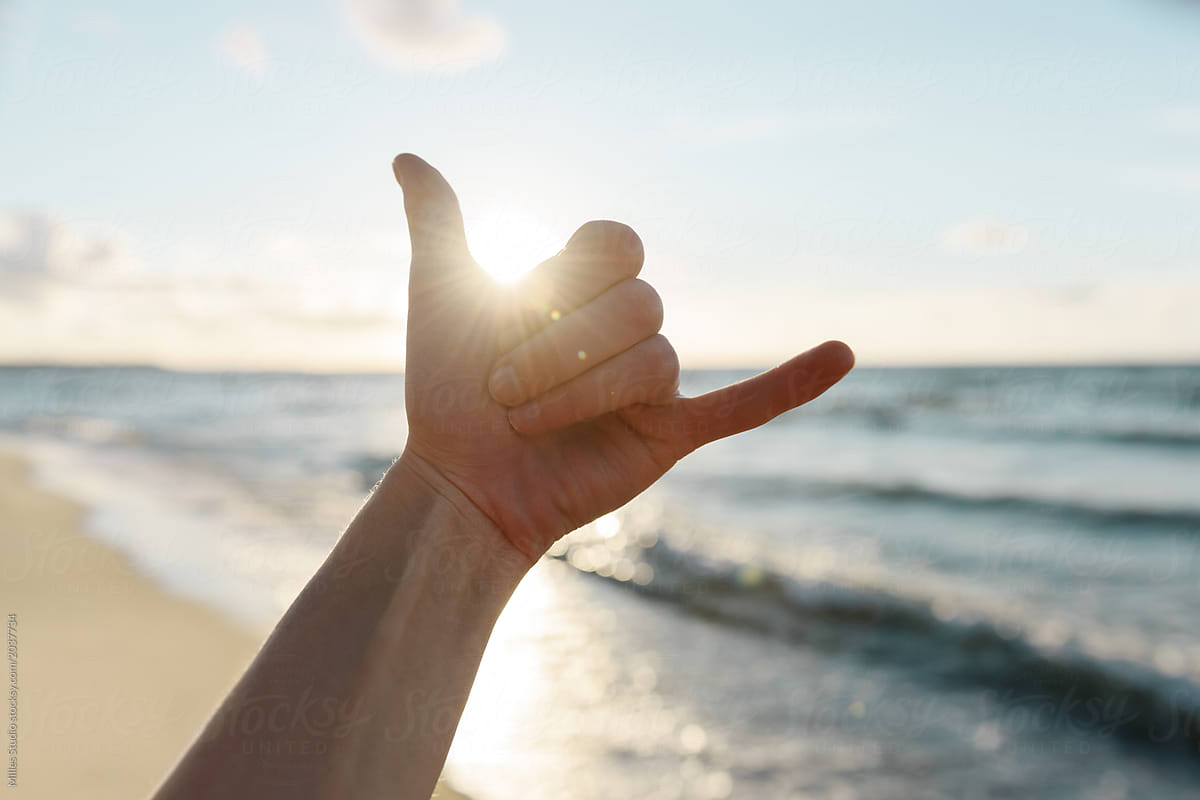 "Crop Hand Showing Surfers Greeting Gesture" by Stocksy Contributor ...