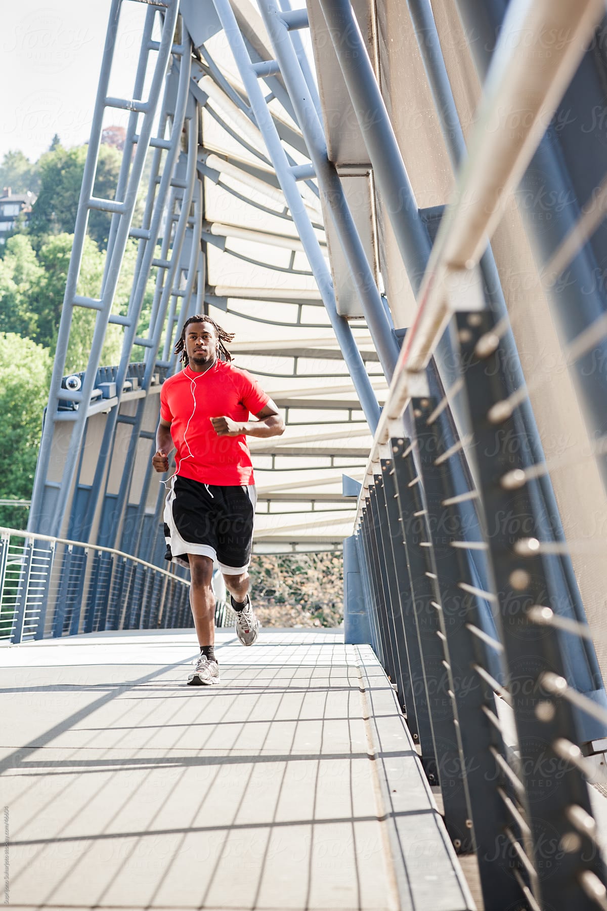 "Male Athlete Running In An Urban Area" by Stocksy Contributor "Take A ...