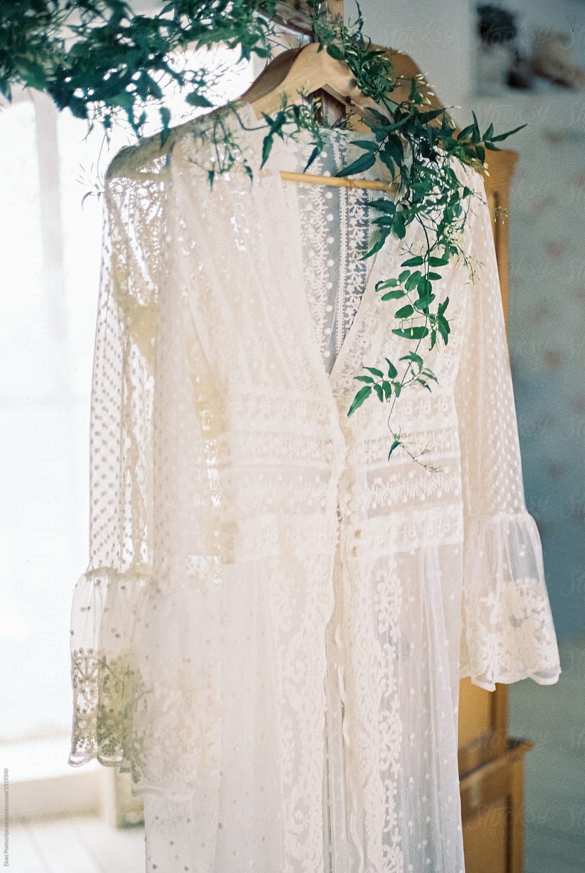 "White Lace Dress Hanging On Hanger" by Stocksy Contributor "Duet ...