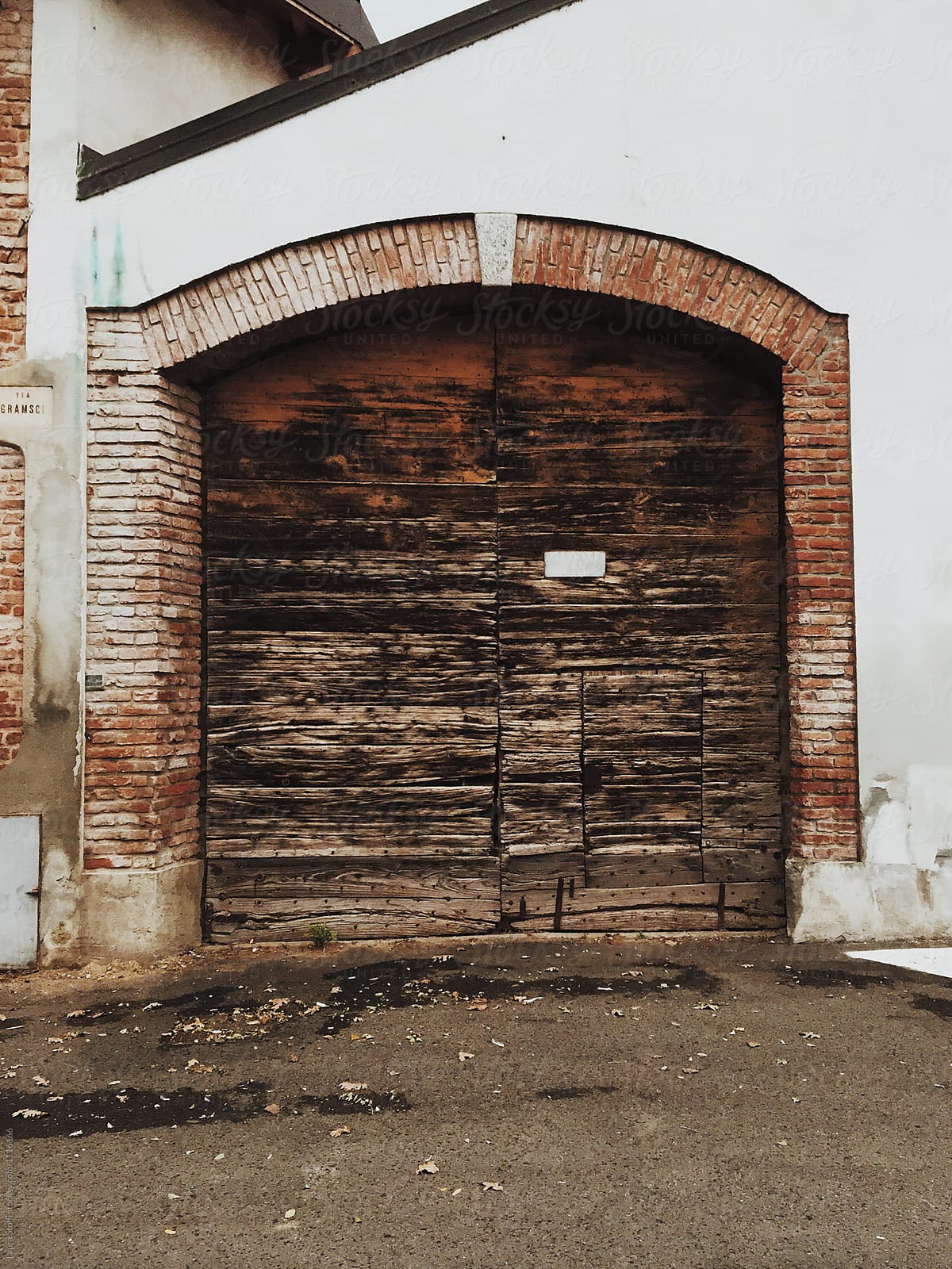 "Old Wooden Main Door In Italian Building" by Stocksy Contributor ...