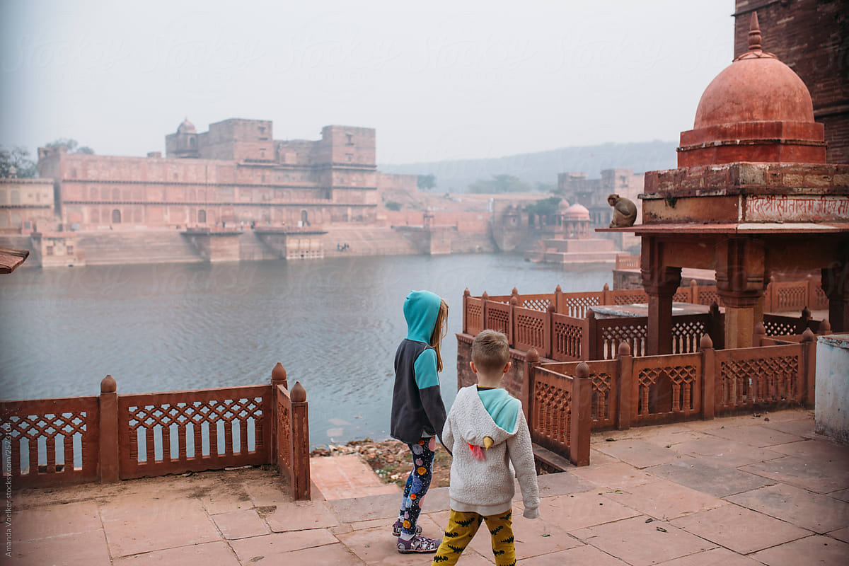 "A Little Boy And Little Girl Stand In An Ancient Indian Water Temple ...