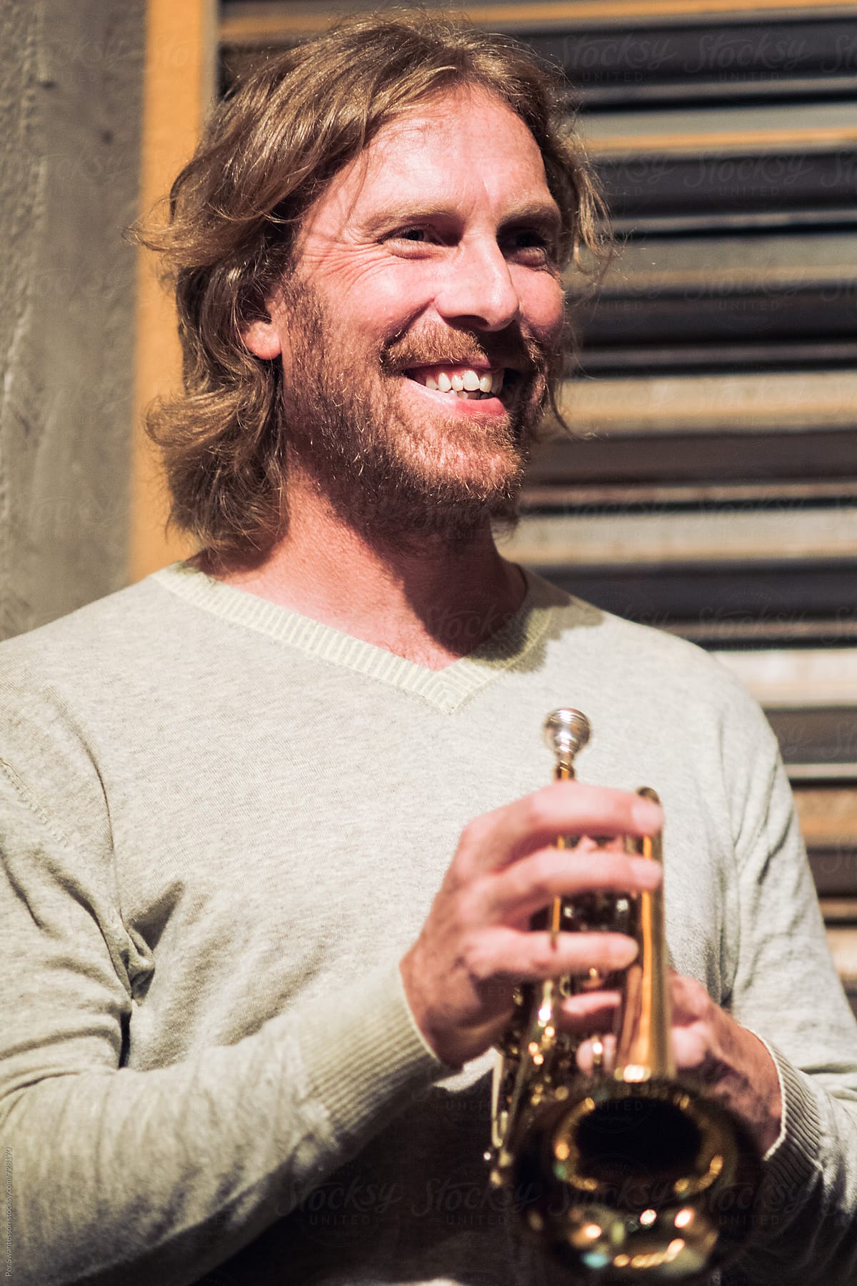 "Happy Musician With His Trumpet" by Stocksy Contributor "PER Images ...