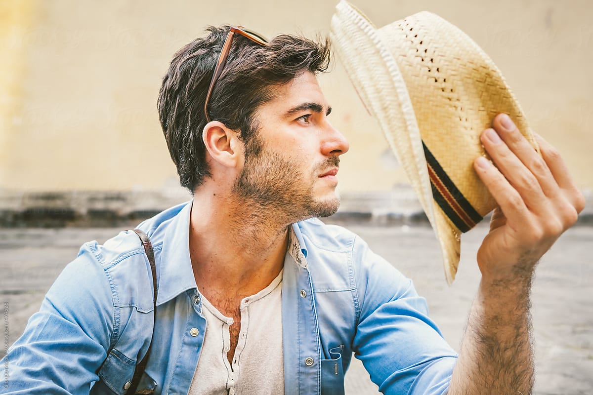 "Handsome Man With A Straw Hat" by Stocksy Contributor "Giorgio Magini ...