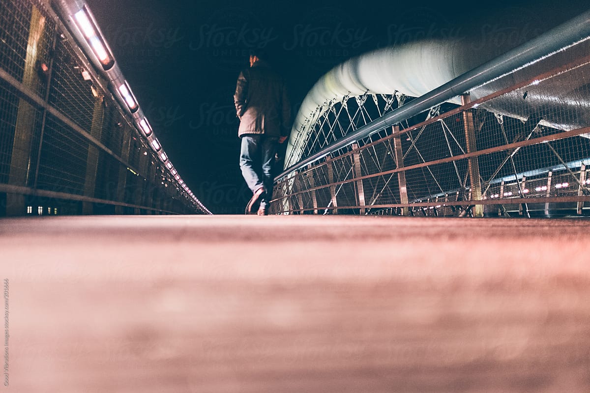 "Man On A Bridge" by Stocksy Contributor "Vero." - Stocksy