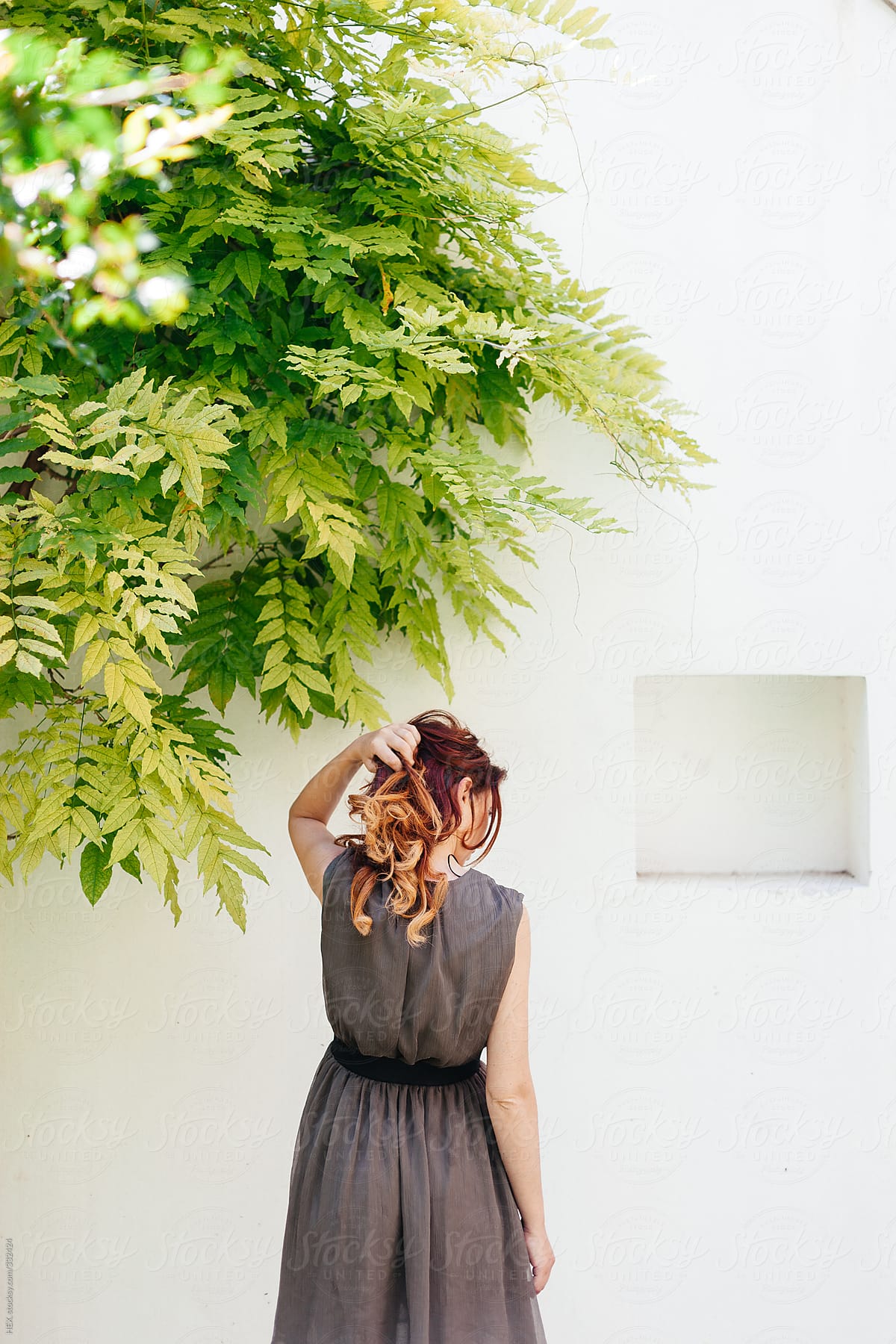 "Back View Of Elegant Ginger Hair Woman Portrait" by Stocksy ...