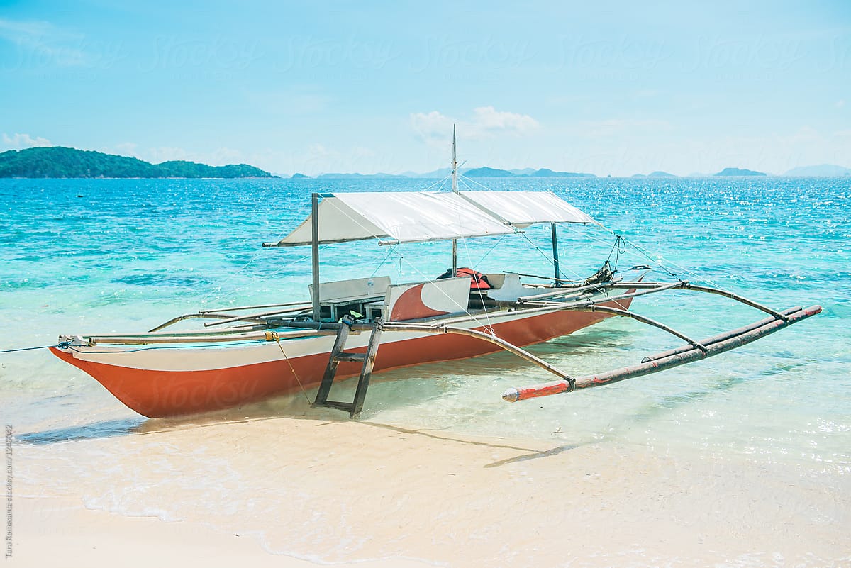 "Island Hopping Boat" by Stocksy Contributor "Tara Romasanta ...