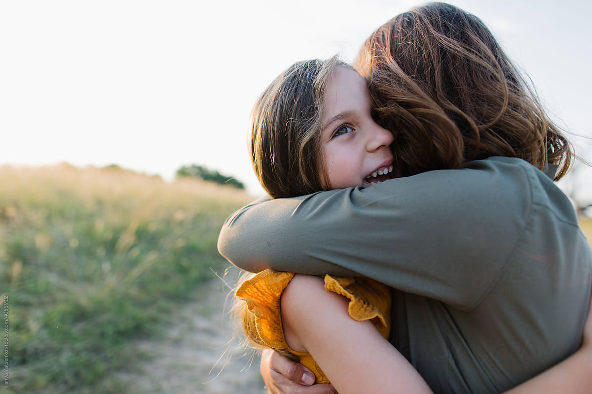 "Happy Girl With Mother" by Stocksy Contributor "Yatanni" - Stocksy