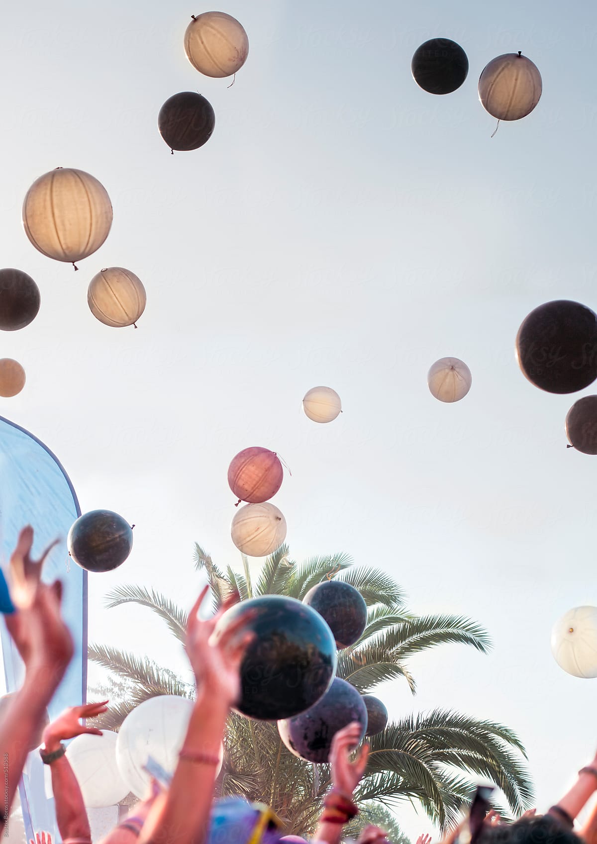 "Hands Up In The Air With Lots Of Balloons In The Sky" by Stocksy ...