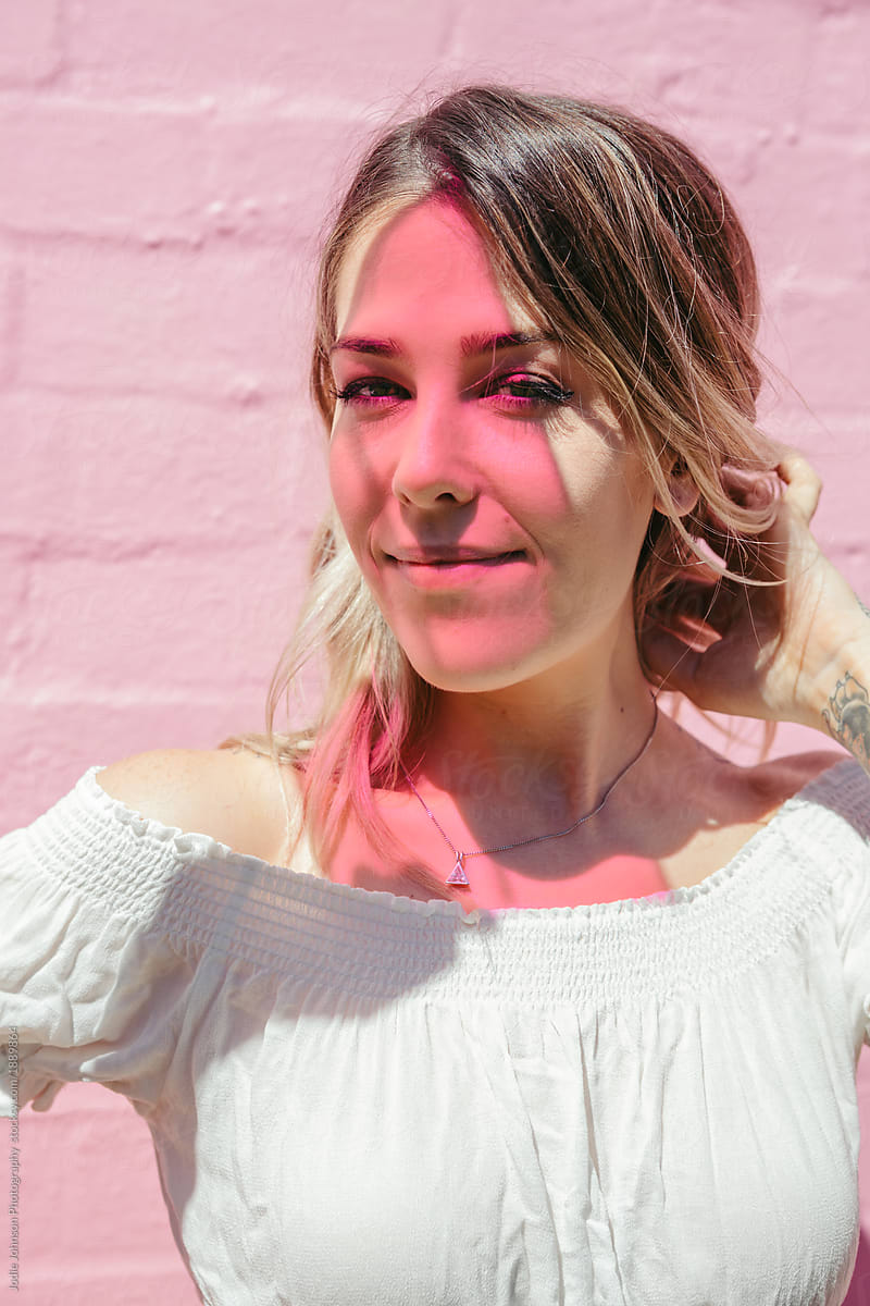 "Pink Light On A Female Face" by Stocksy Contributor "Jodie Johnson ...