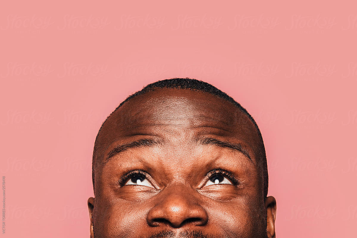 "Happy Young Black Man Smiling And Looking Up" by Stocksy Contributor ...