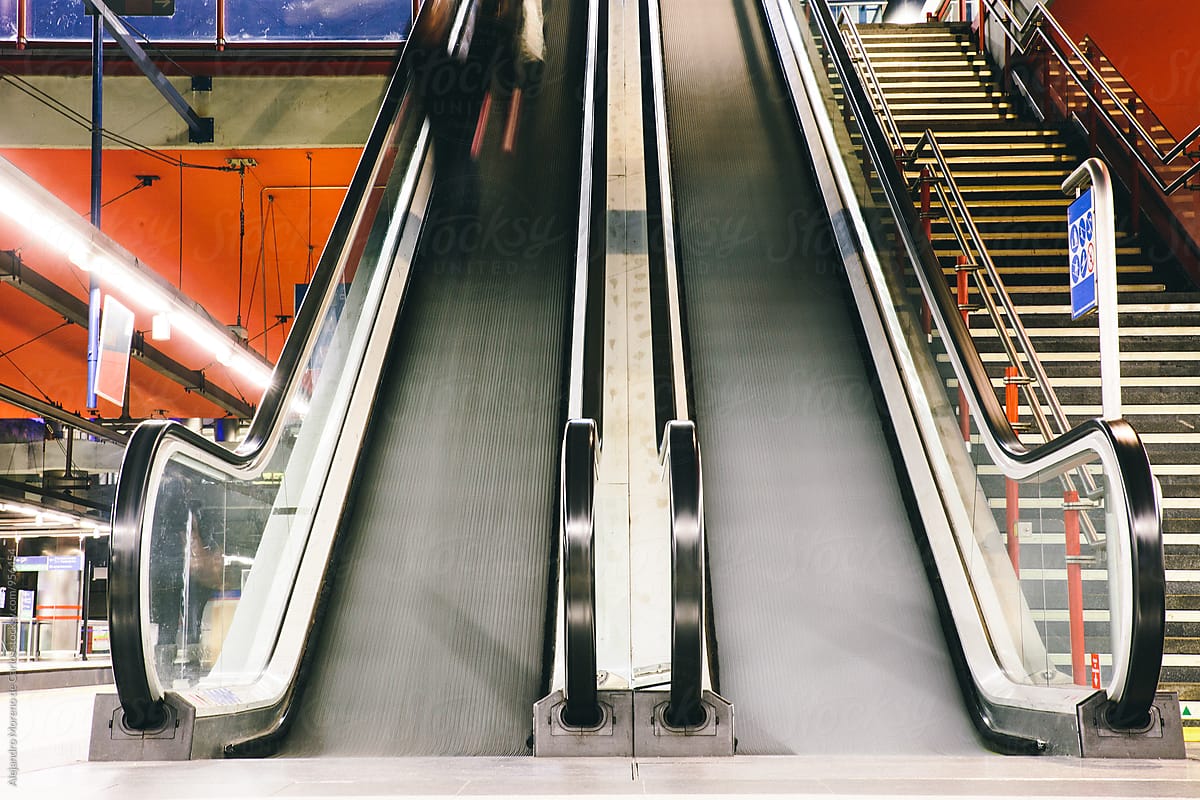 "Subway Escalators In Motion" by Stocksy Contributor "Alejandro Moreno ...
