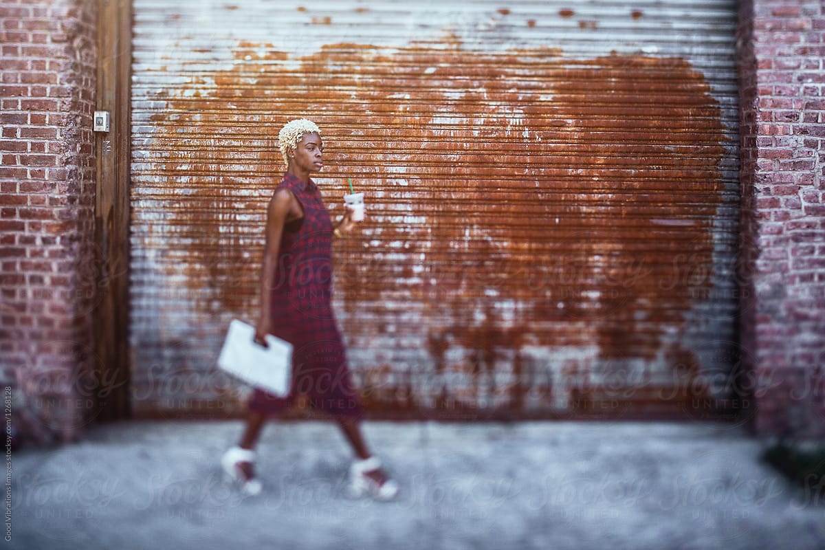 "Stylish Woman Walking On The Street" by Stocksy Contributor "Vero ...