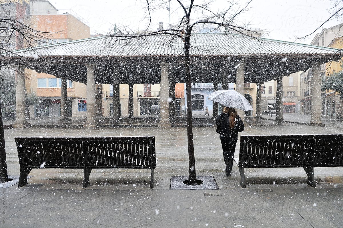 "First Snowfall In Town" by Stocksy Contributor "Bisual Studio" - Stocksy