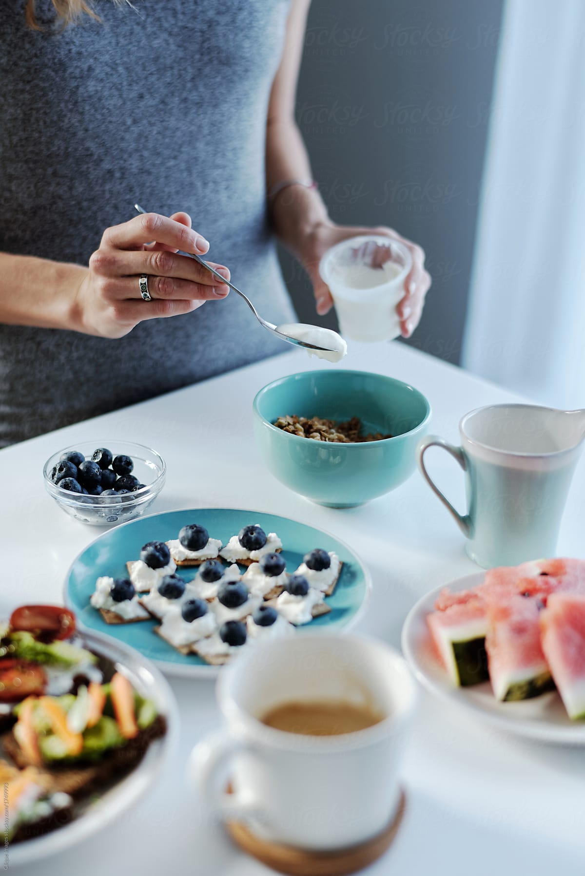 "Woman Cooking Healthy Breakfast" by Stocksy Contributor "Clique Images ...