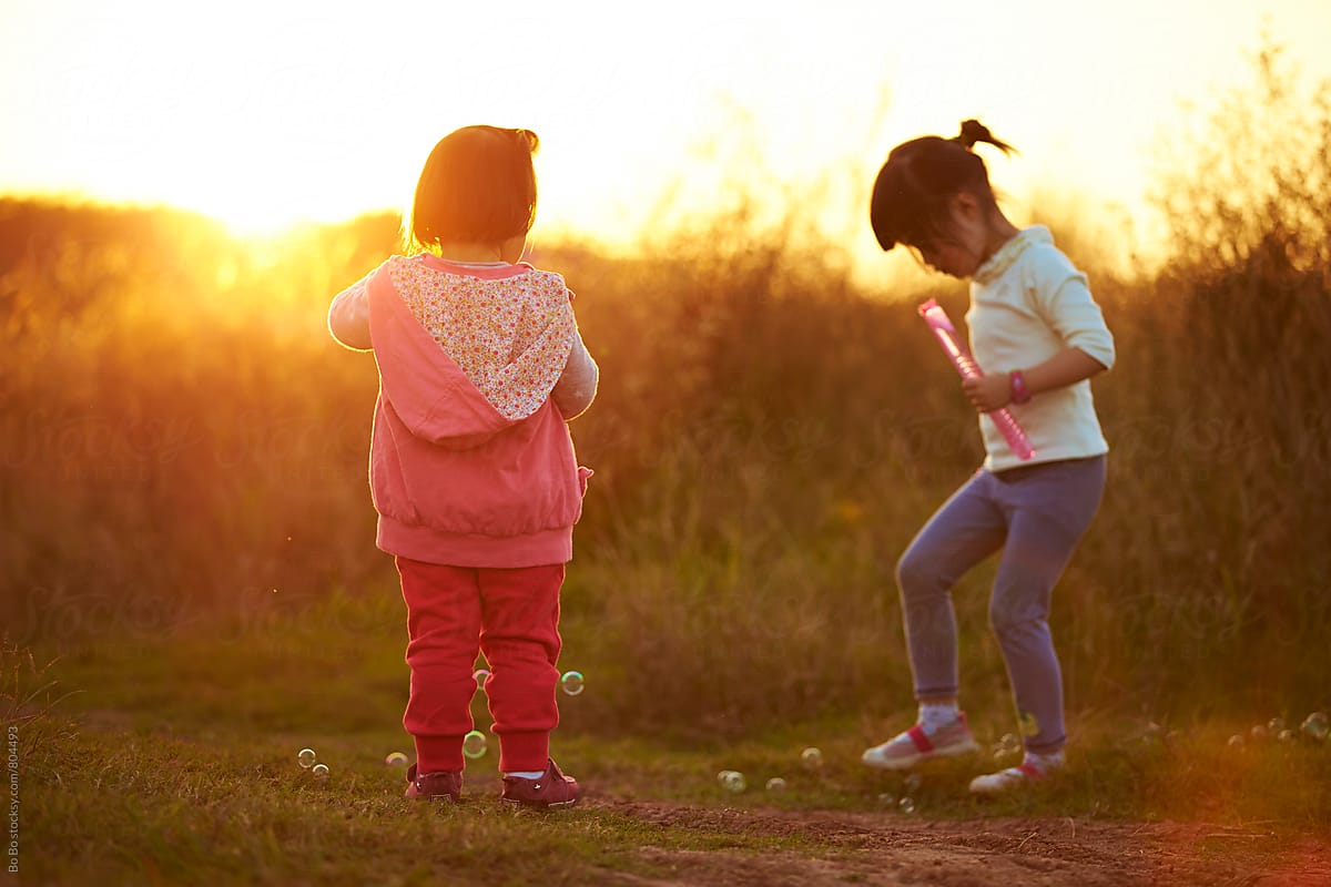 Little Girl Playing Outside Royalty Free Stock Images