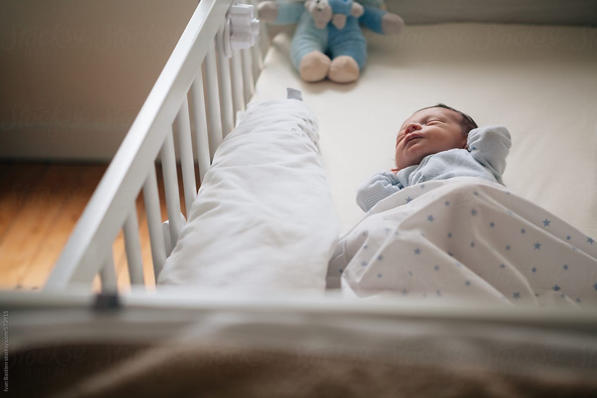 "Newborn Boy Stretching And Smiling In His Sleep" by Stocksy ...