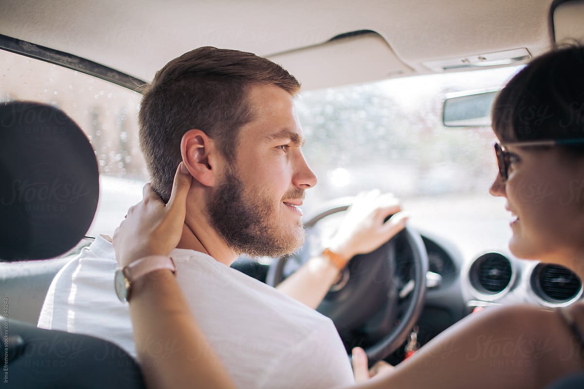 "Young Affectionate Couple In A Car" by Stocksy Contributor "Irina ...