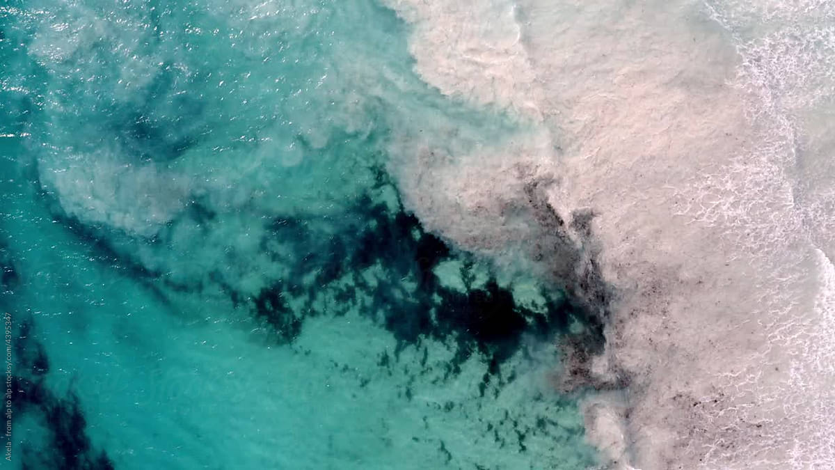 "Ocean Mixing With Sand" by Stocksy Contributor "Akela - From Alp To ...