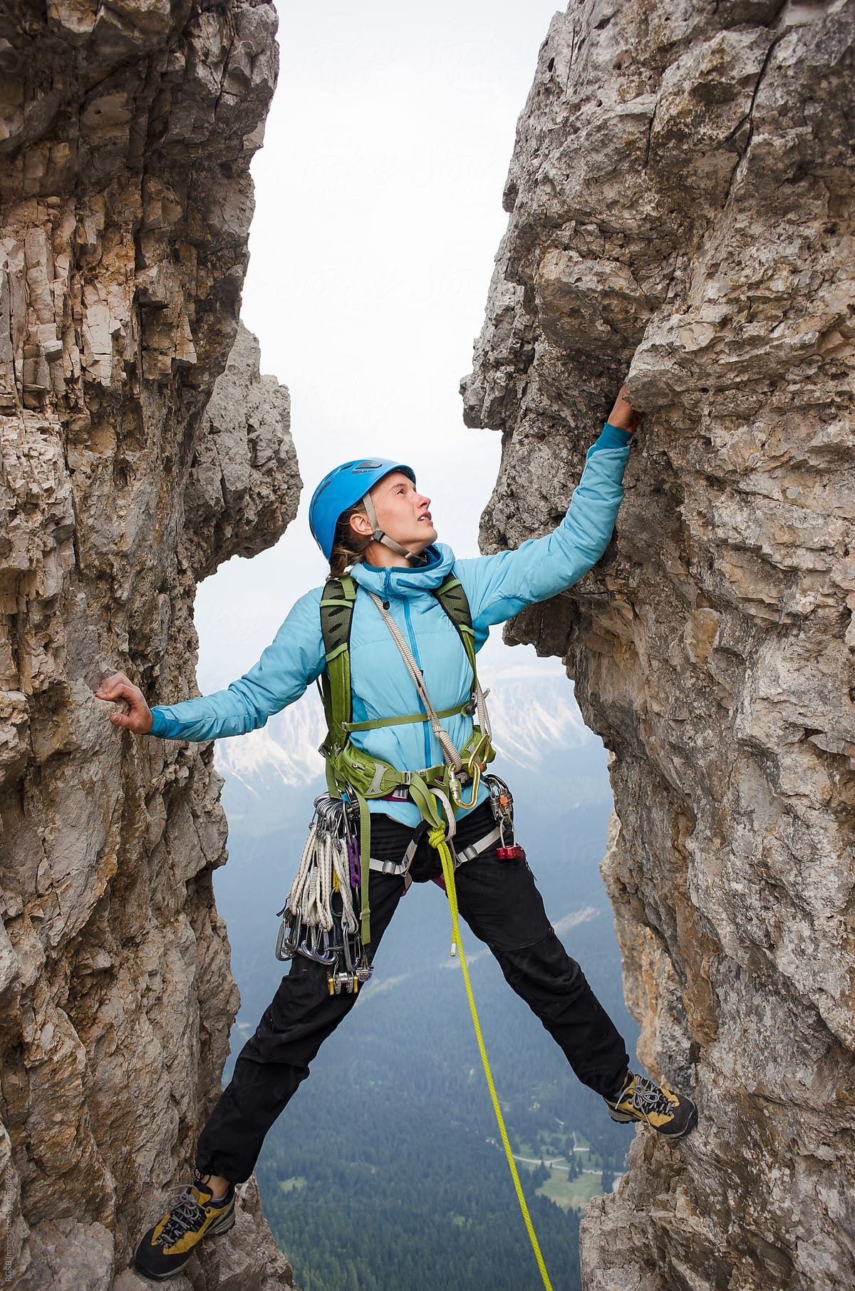 "Female Alpinist Climbing A Rock Chimney In Dolomites" by Stocksy ...