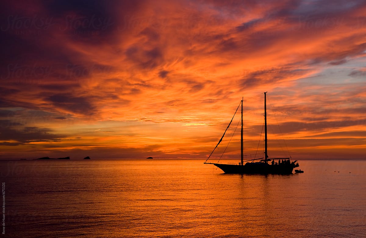 "Boat At Sunset" by Stocksy Contributor "Rene De Haan" - Stocksy