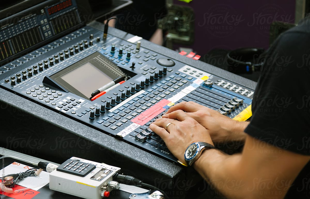 "Sound Engineer Working With A Mixer In A Live Show" by Stocksy ...