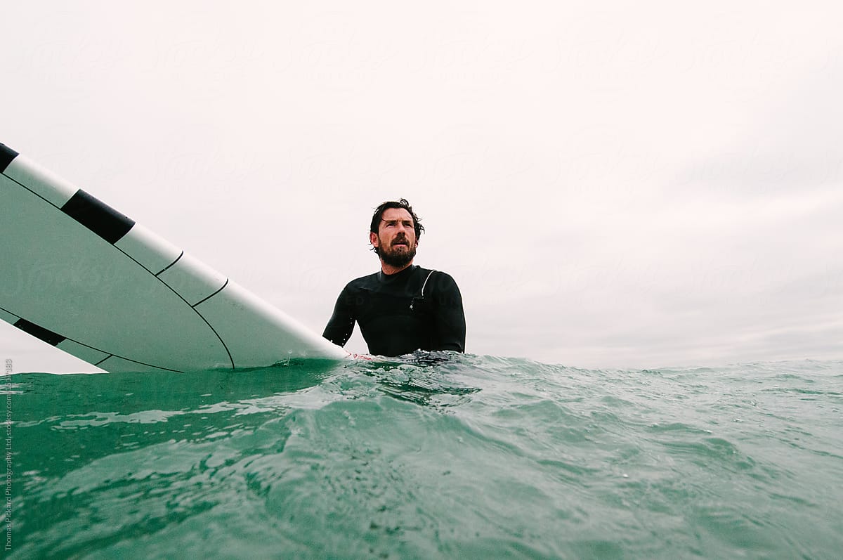 "Surfer Looking For Waves, New Zealand." by Stocksy Contributor "Thomas ...