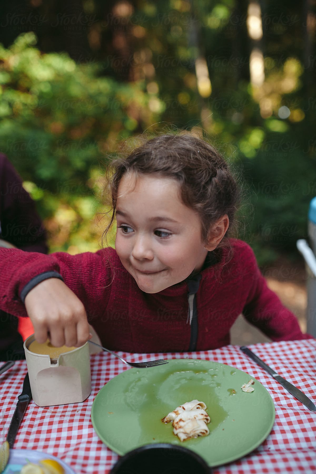 "Little Girl Enjoying Pancakes On Picnic Table" by Stocksy Contributor ...