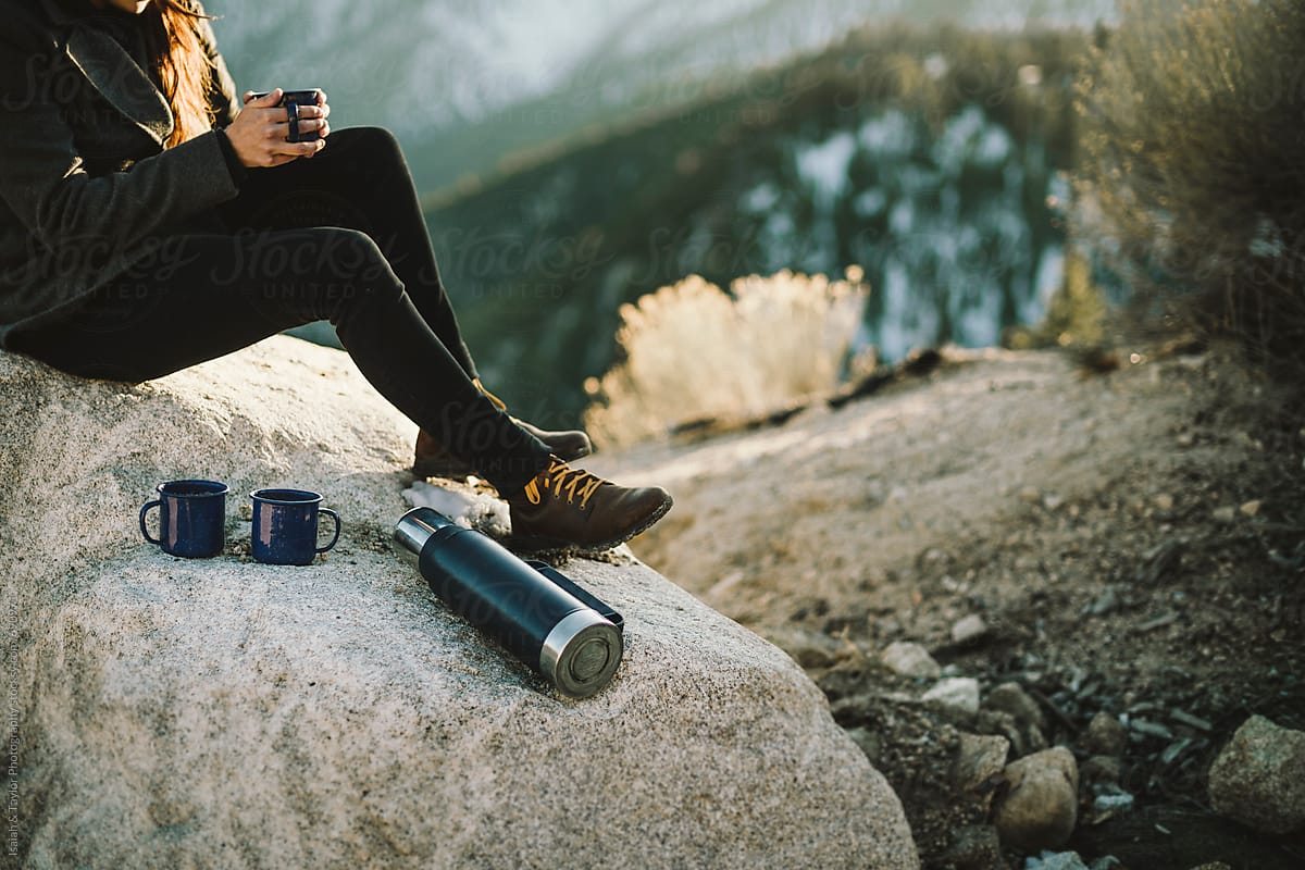 "Drinking Coffee On A Rock" by Stocksy Contributor "Itla" - Stocksy
