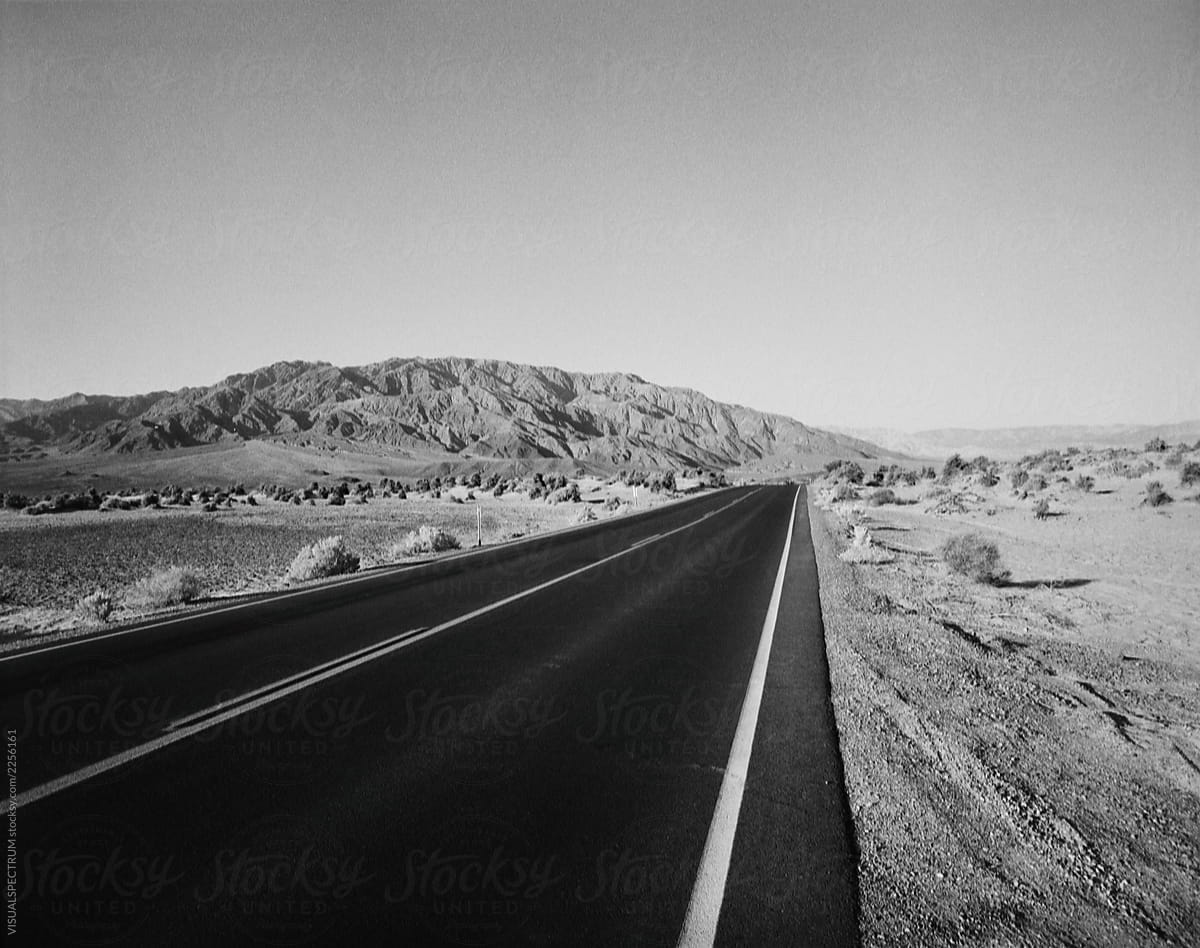 "Empty Road Through California Landscape On BW Film" by Stocksy ...
