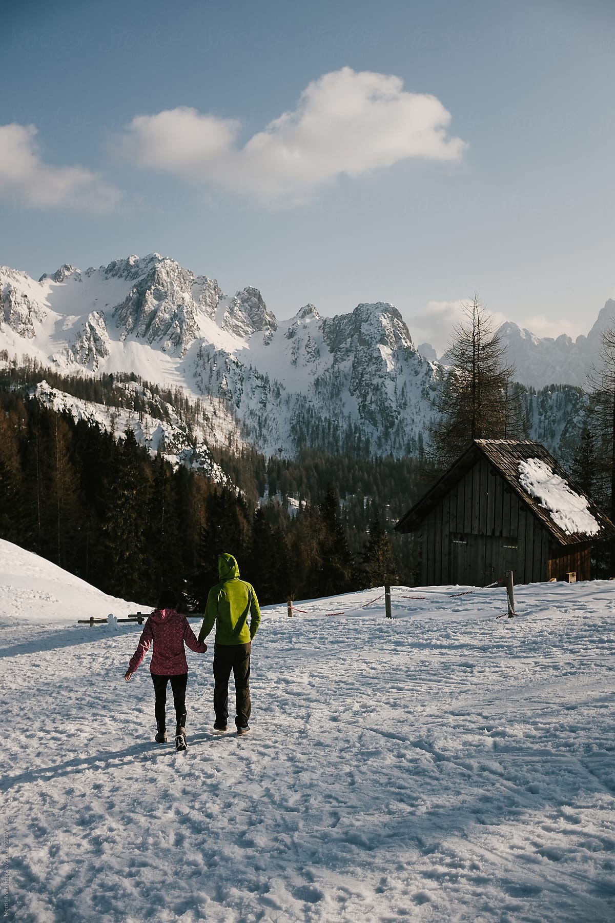 "Couple Walking To Mountains Covered By Snow" by Stocksy Contributor ...