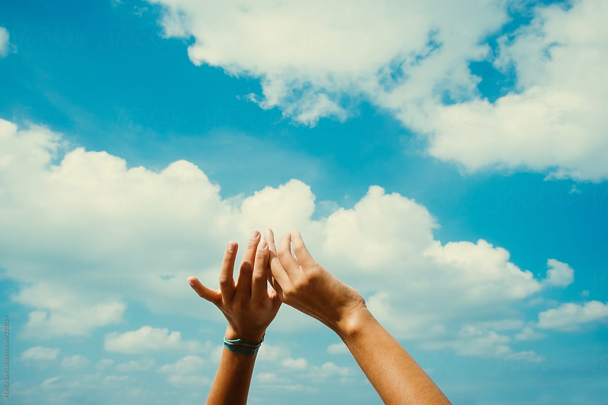 "Hands Up In Sky" by Stocksy Contributor "Maia Images" - Stocksy