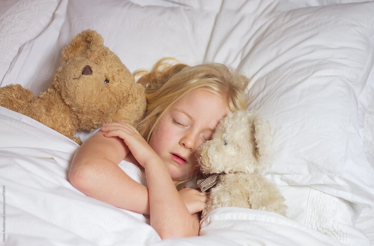 "A Little Girl In Bed With Her Teddy Bears." by Stocksy Contributor ...