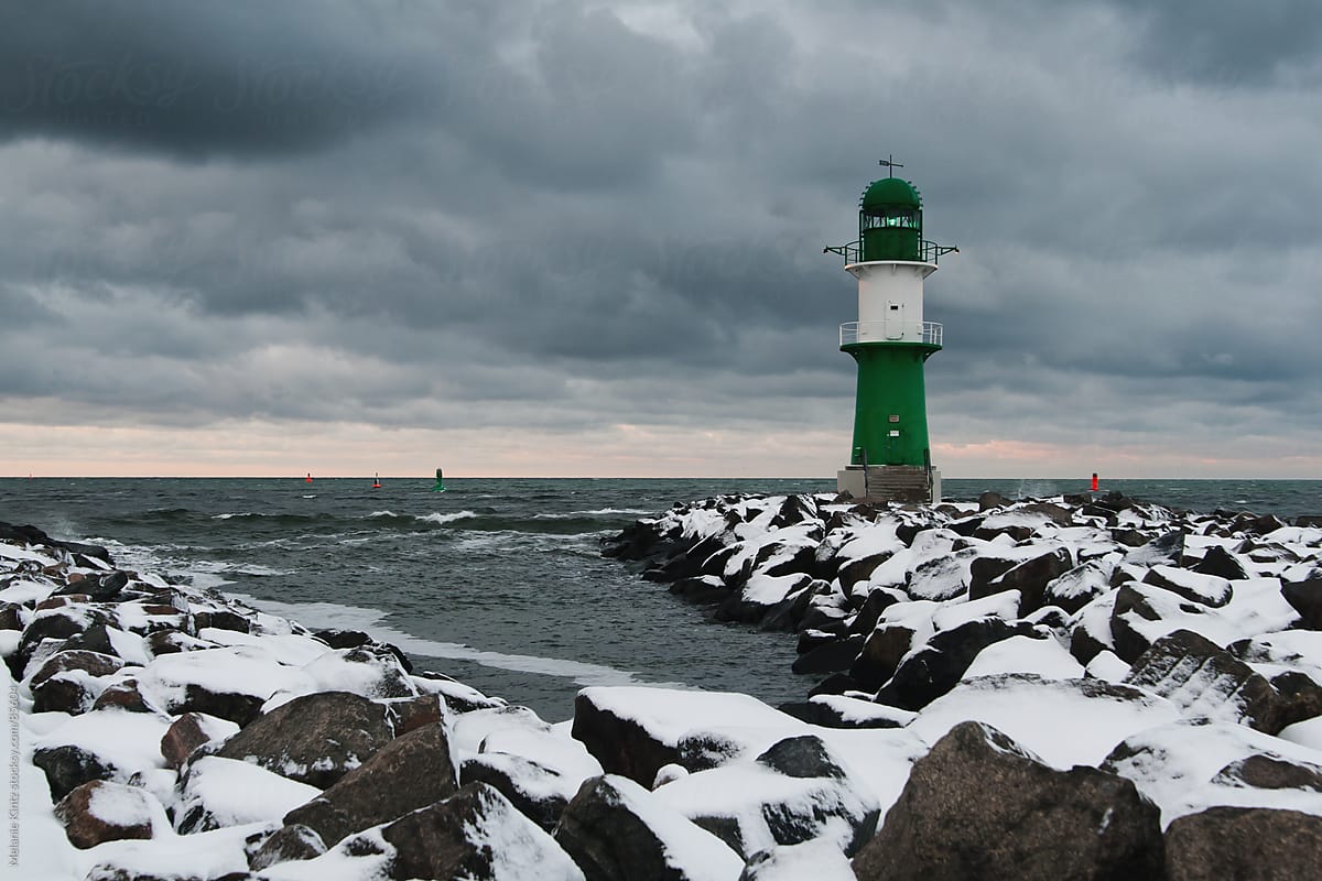 "Lighthouse In Winter At Sunset" by Stocksy Contributor "Melanie Kintz ...