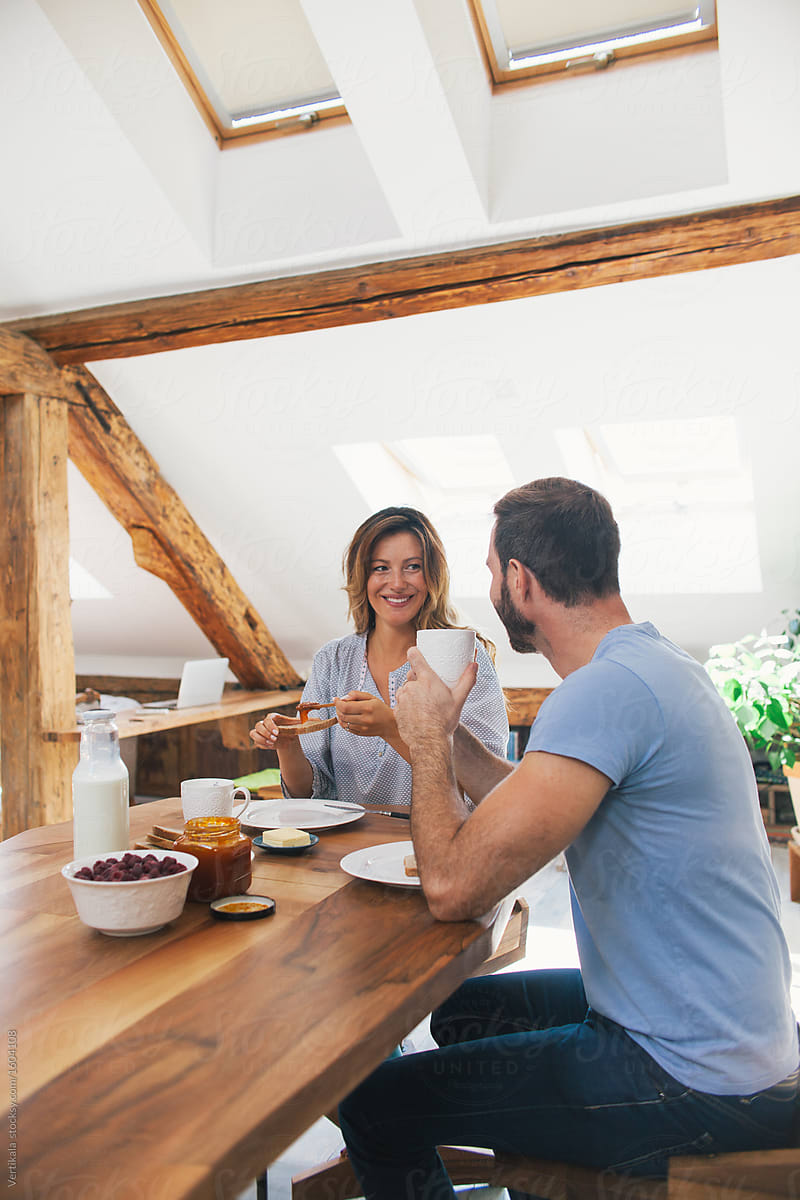 "Married Couple In Their Apartment" by Stocksy Contributor "Marija ...