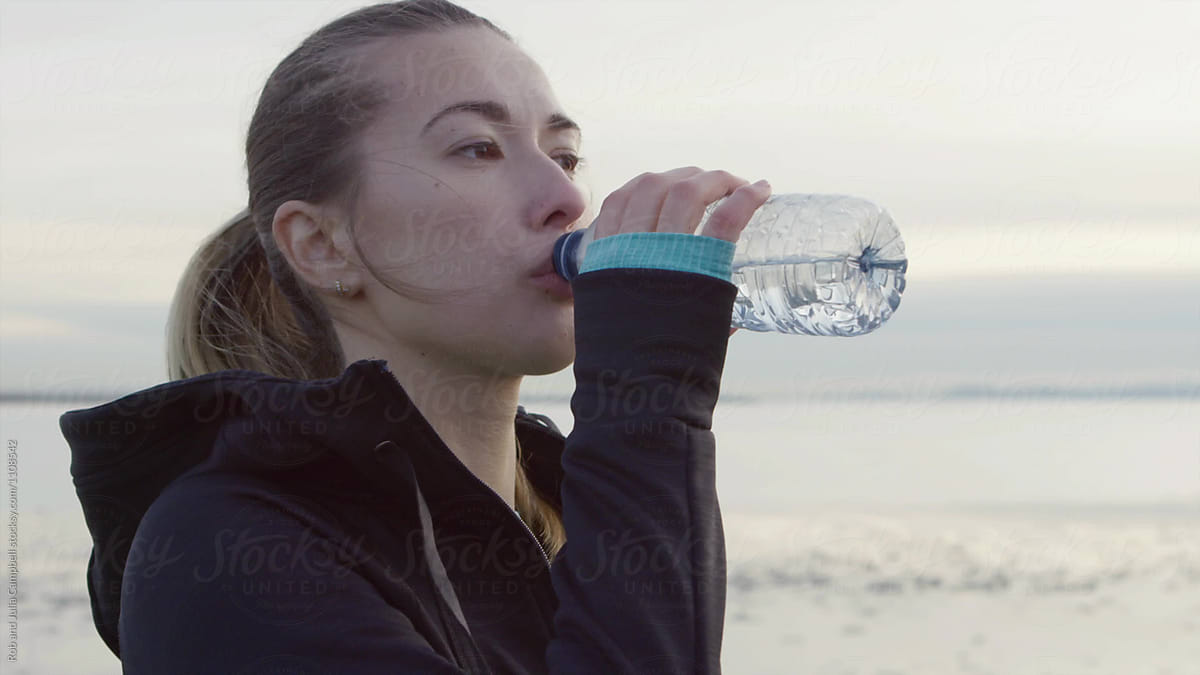 "Young, Healthy Caucasian Woman Training Hard Outside - Drinking Water ...
