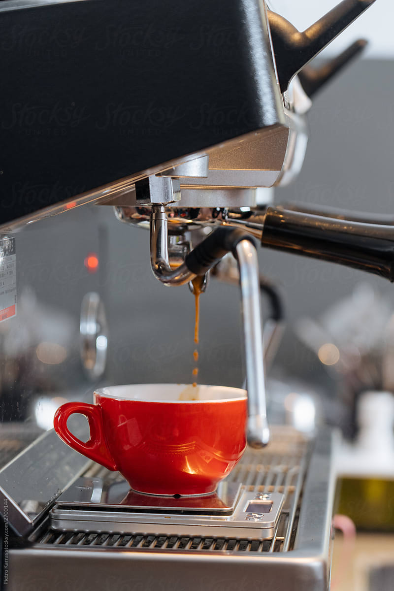 "Coffee Machine Making Hot Beverage" by Stocksy Contributor "Pietro ...