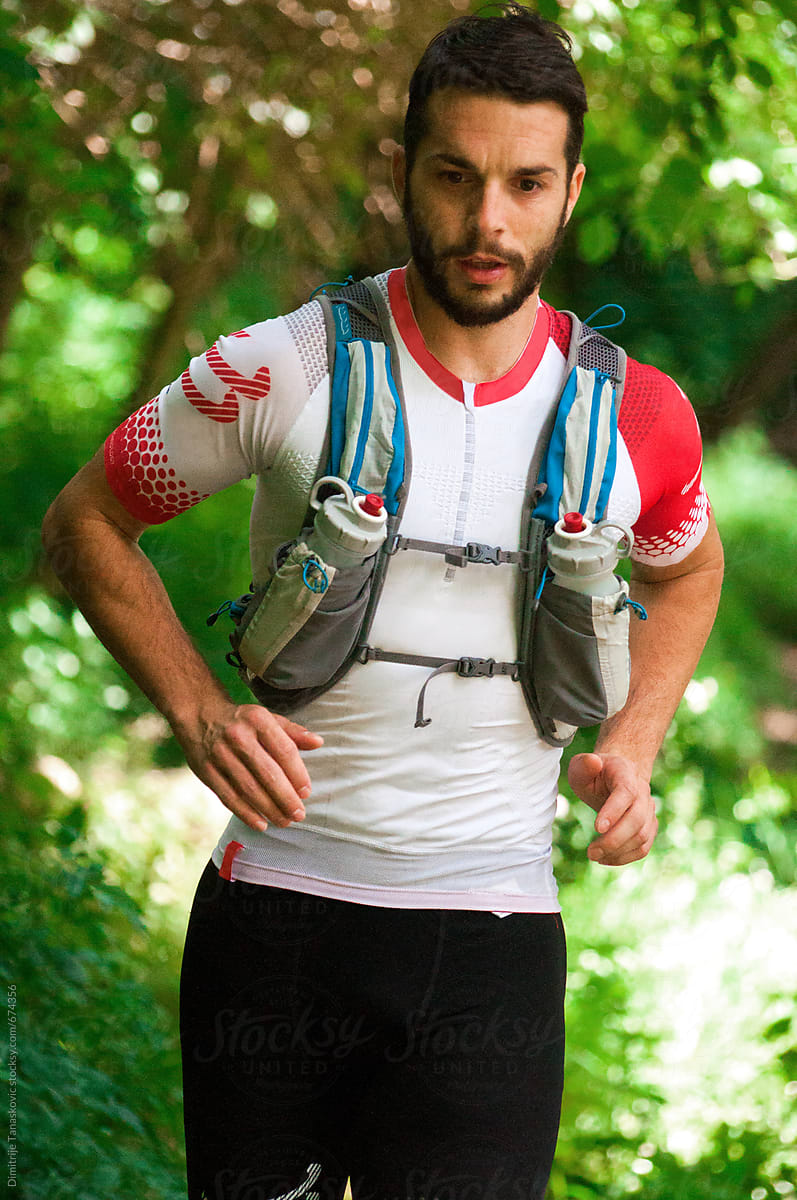 "Man Running In Nature" by Stocksy Contributor "Dimitrije Tanaskovic ...